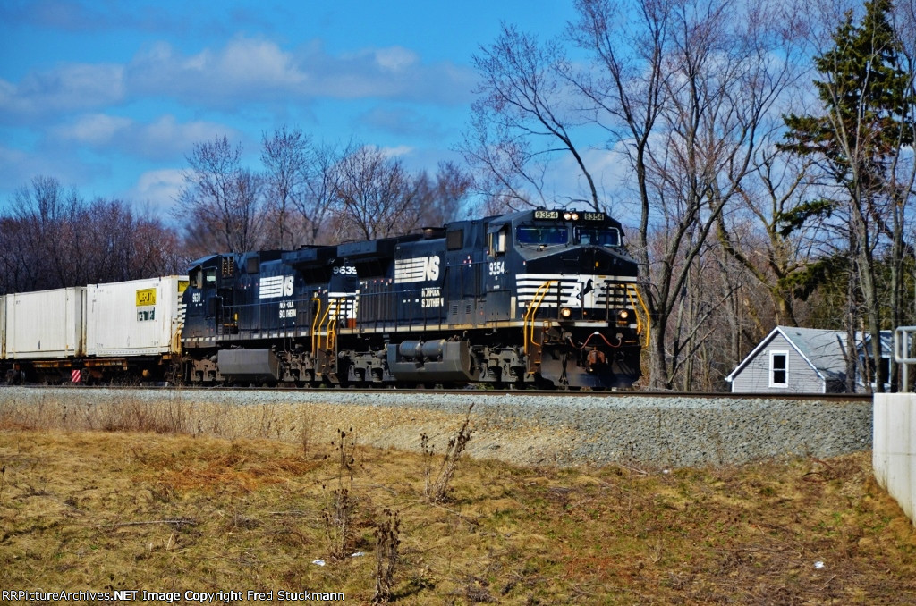 NS 9354 is about to cross SR82.
